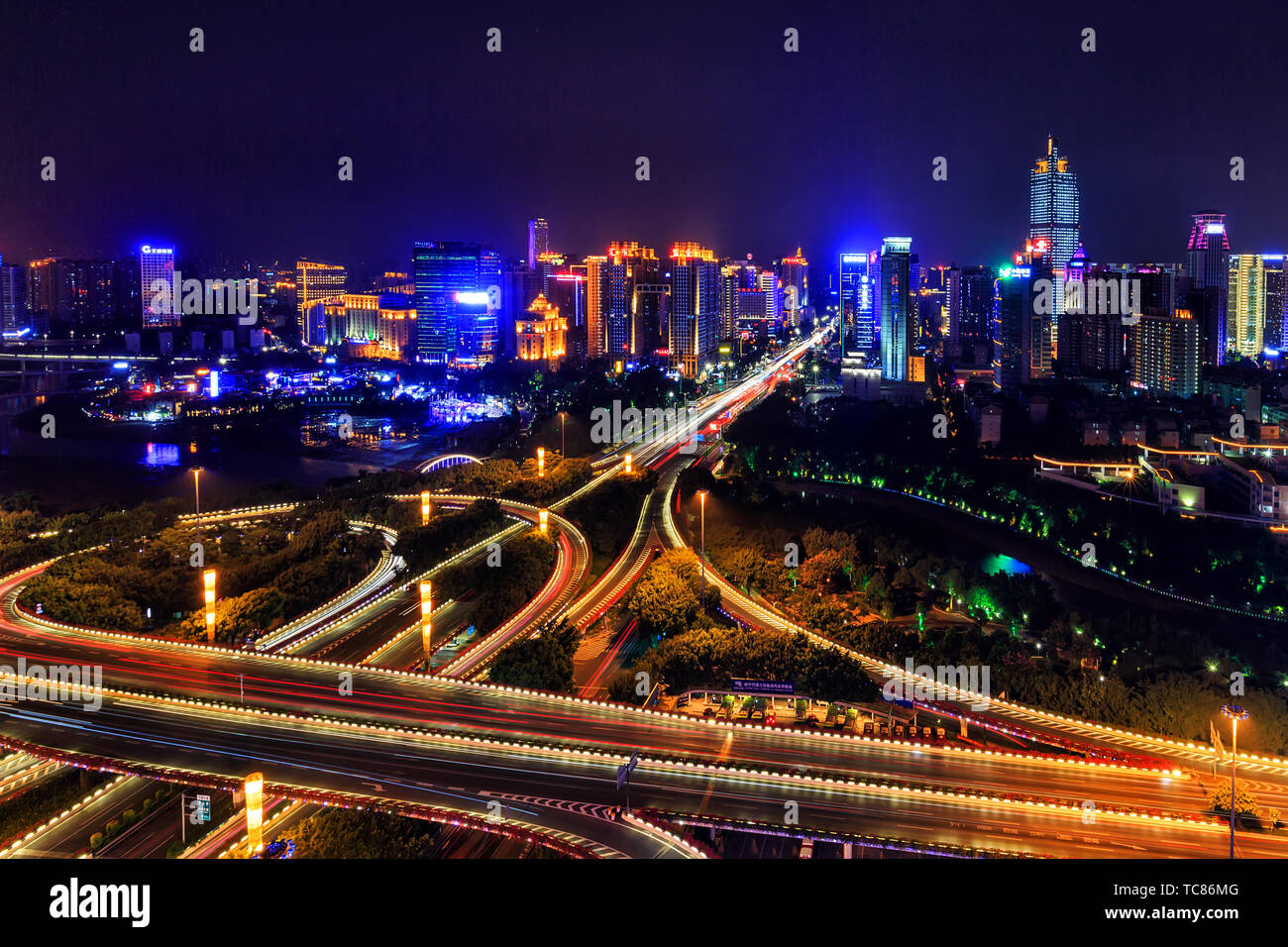 City night view, sunset, overpass, light rail Stock Photo - Alamy