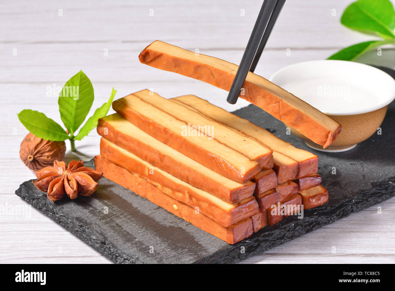 Spiced dried tofu Stock Photo - Alamy