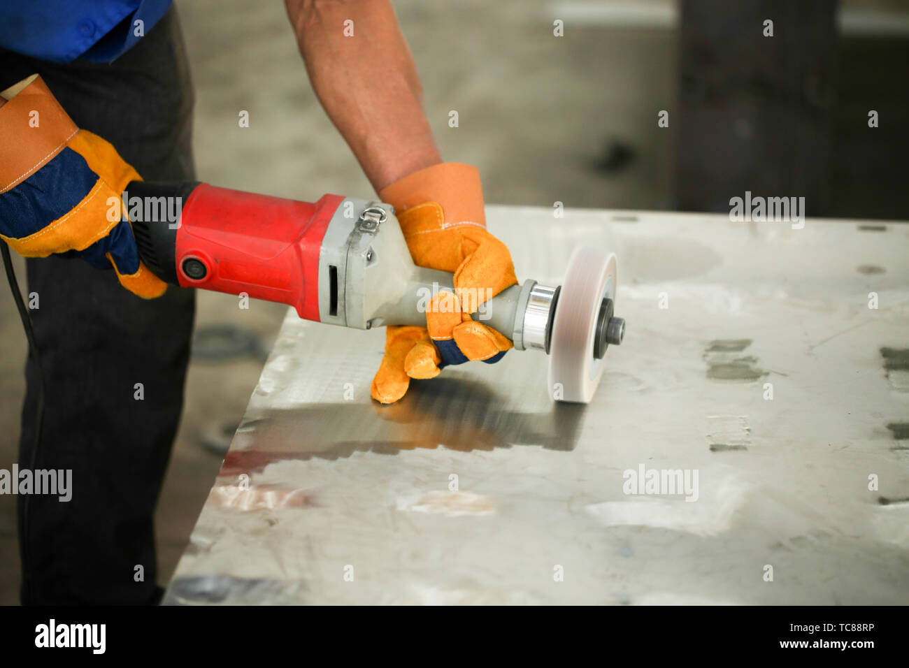 The workers are polishing and polishing Stock Photo - Alamy