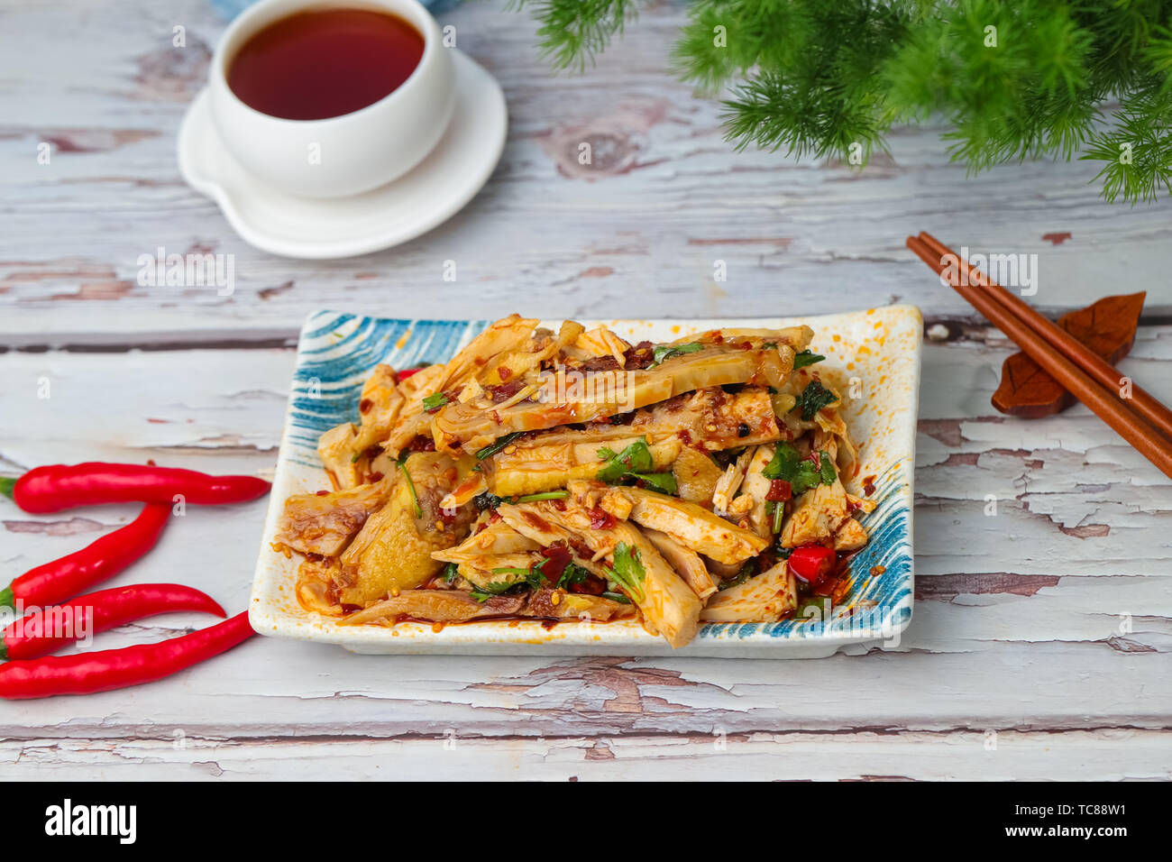 drooling chicken, stick chicken Stock Photo - Alamy