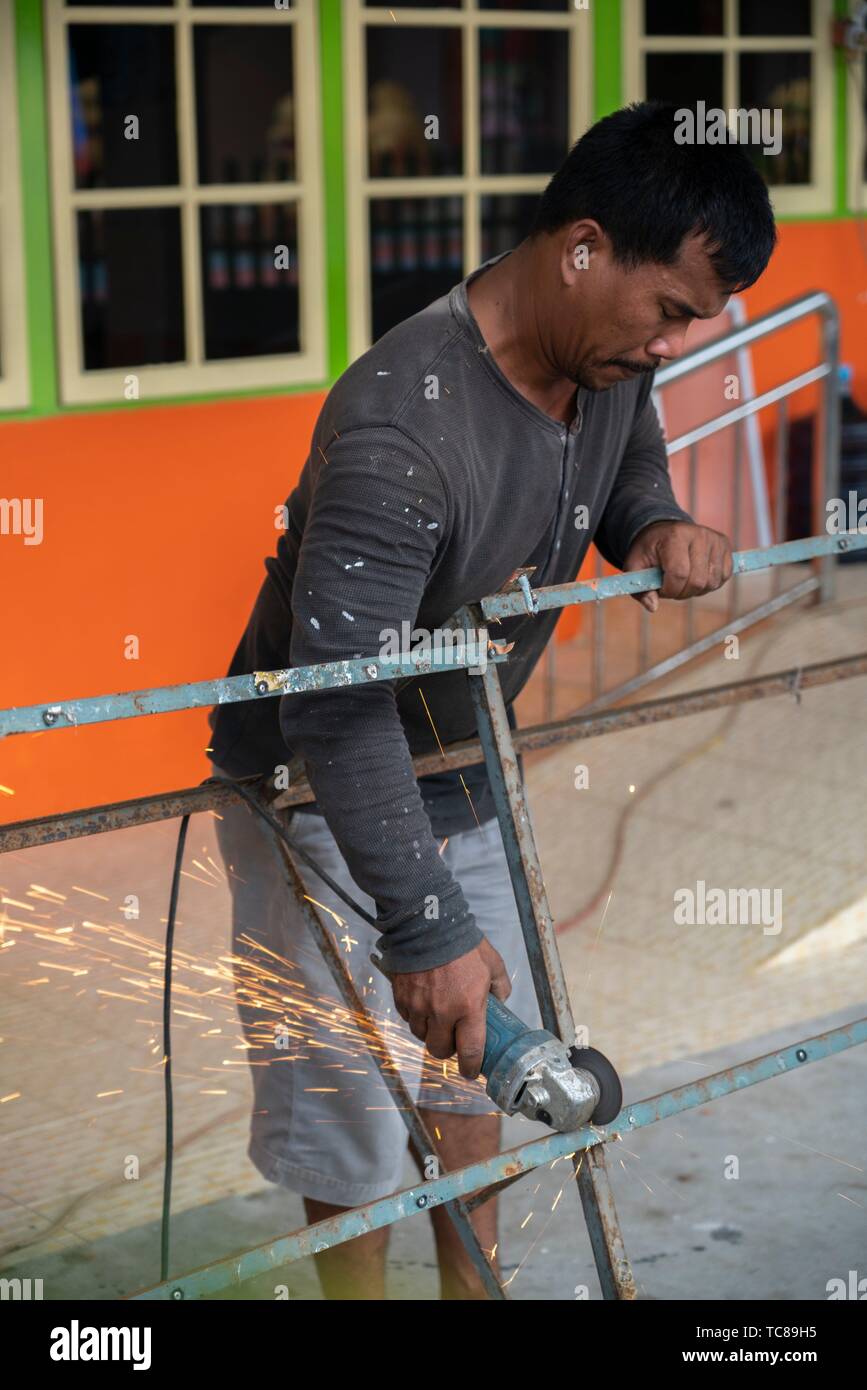 Angle grinder man hi-res stock photography and images - Alamy