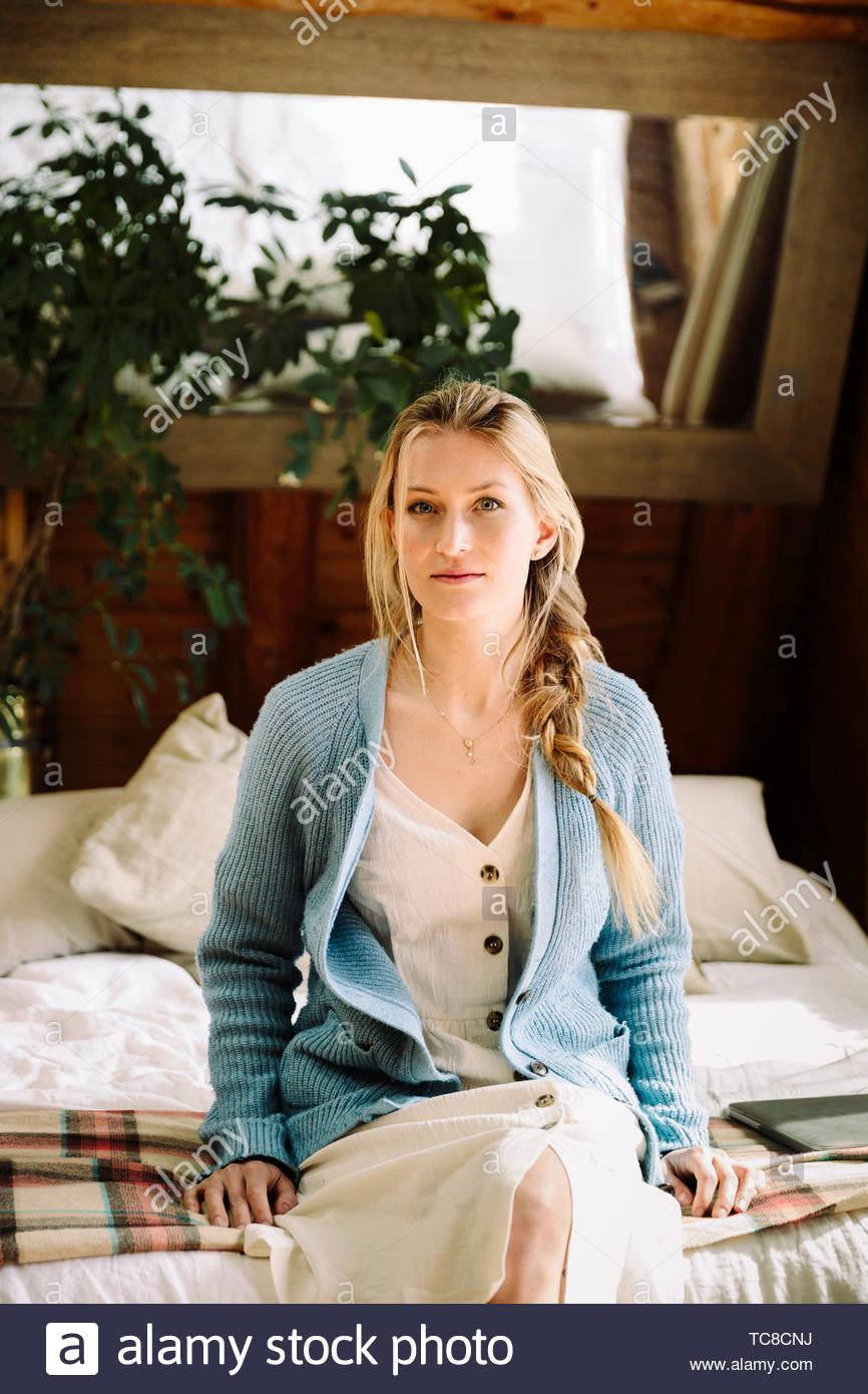 Sitting edge of bed hi-res stock photography and images - Alamy