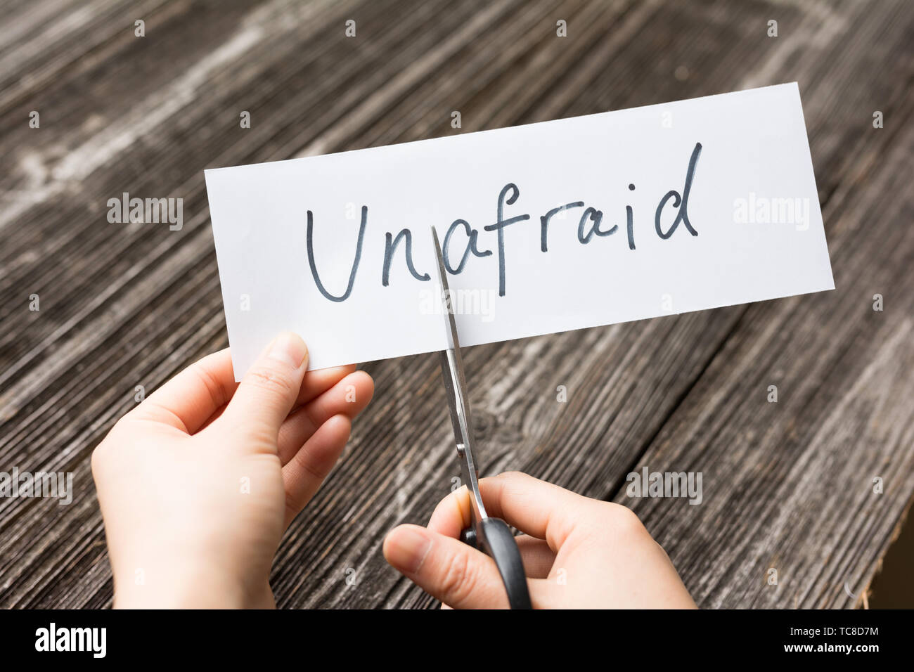 Reynolds card with text on old wood plate Stock Photo - Alamy