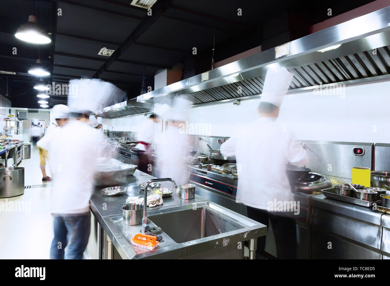 Modern and busy chefs Stock Photo - Alamy