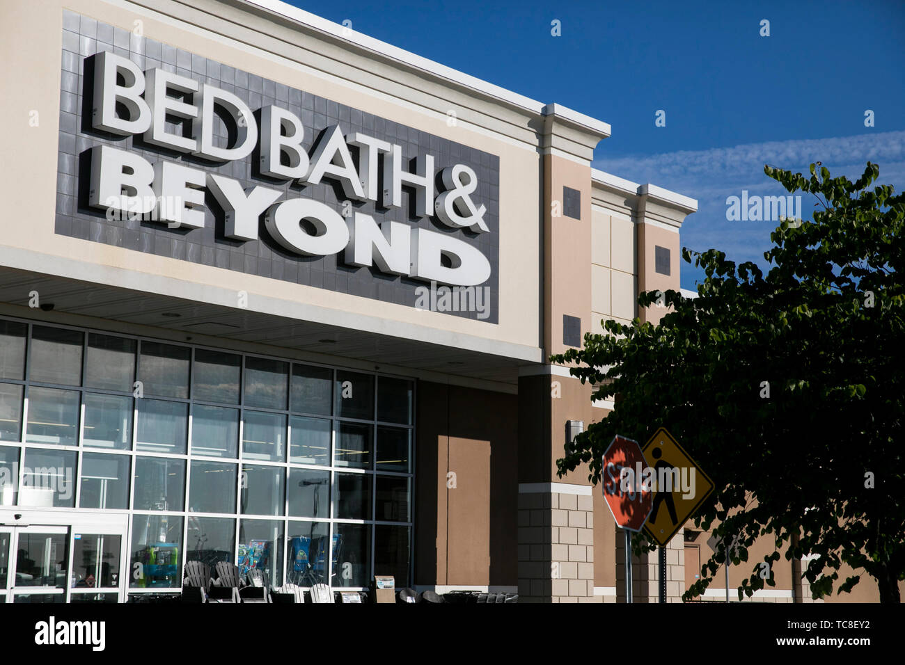 A logo sign outside of a Bed Bath & Beyond retail store location in Martinsburg, West Virginia ...