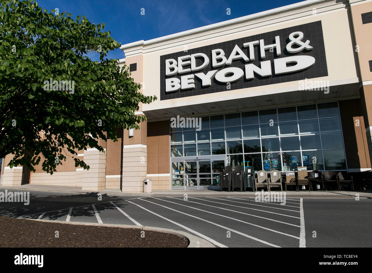 A logo sign outside of a Bed Bath & Beyond retail store location in Martinsburg, West Virginia ...