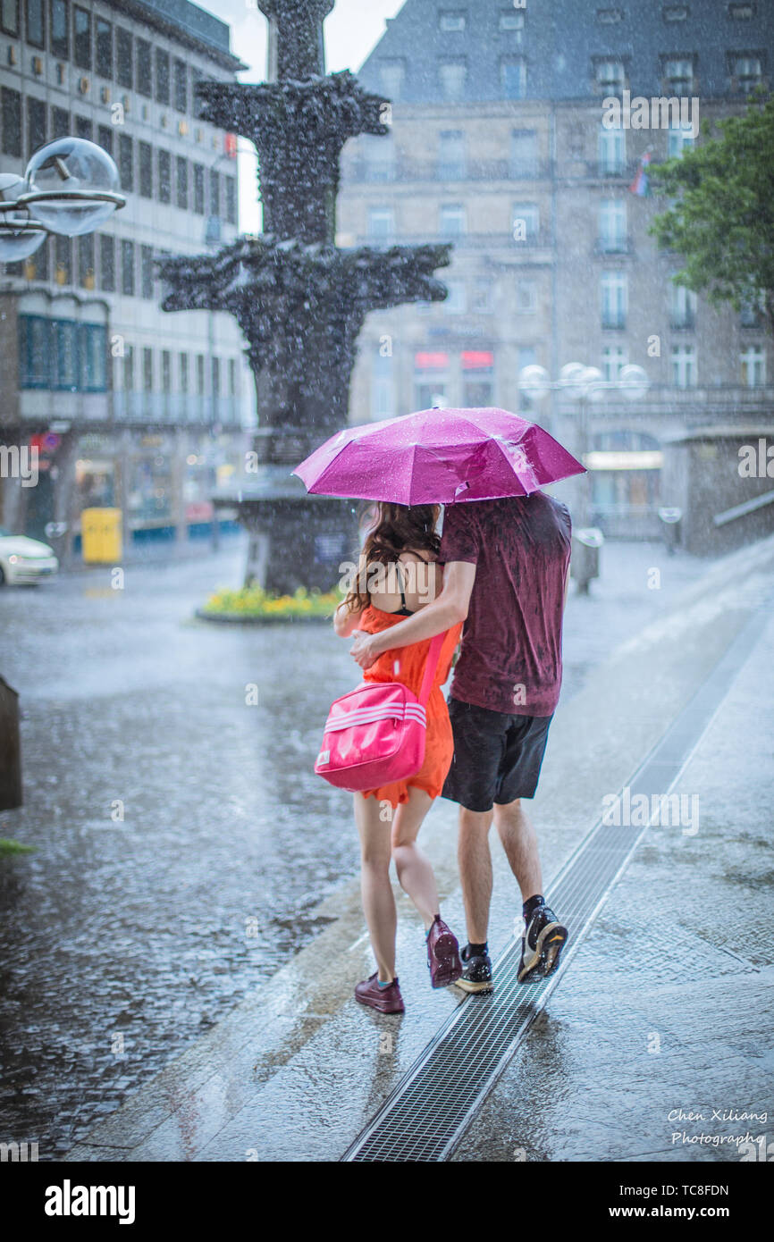 Girls in rain with umbrellas hi-res stock photography and images - Alamy