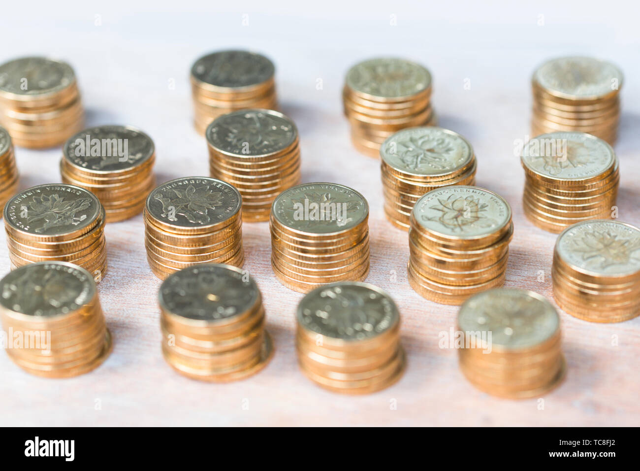 Stacked gold coins Stock Photo - Alamy