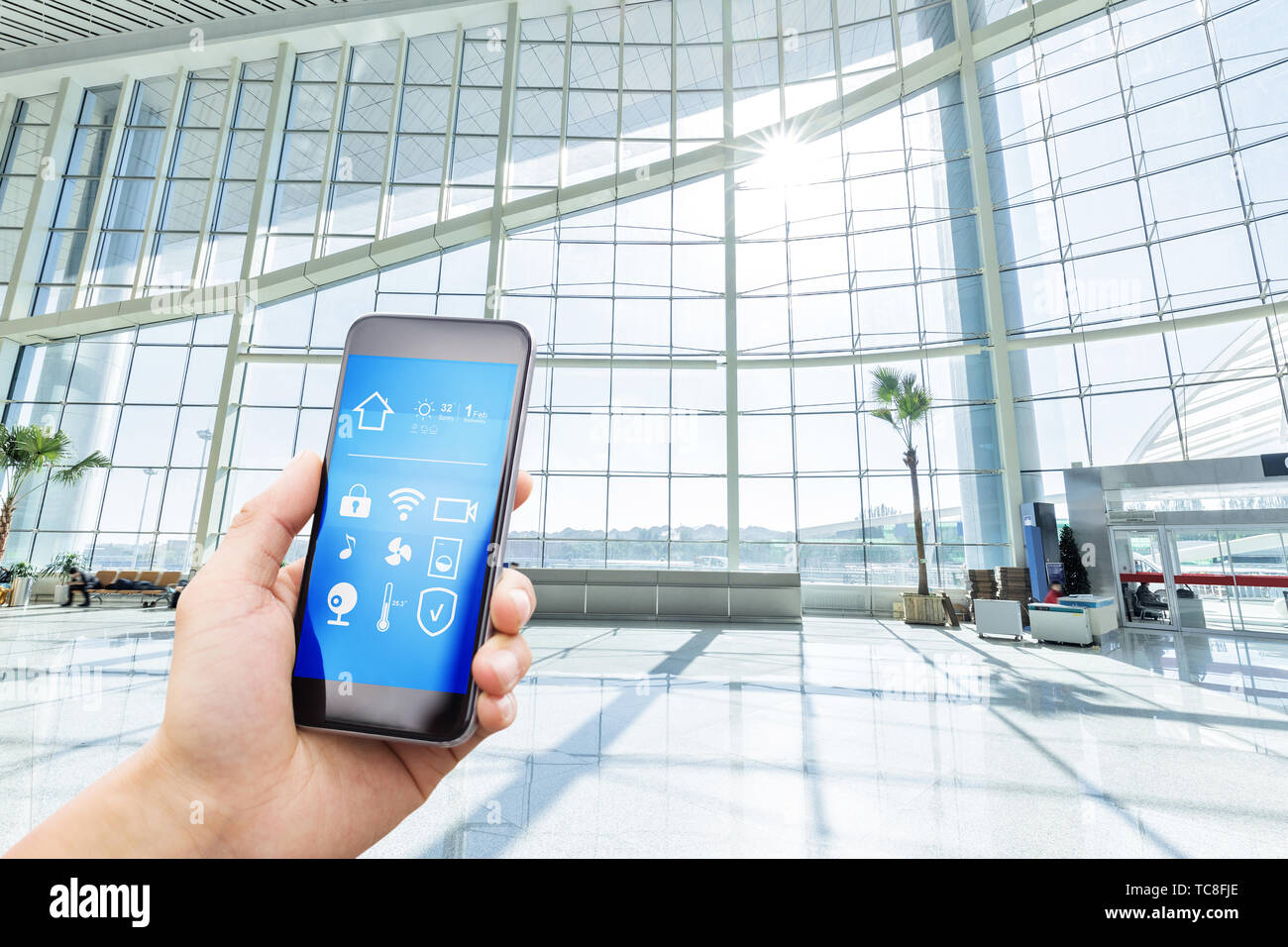 smart phone with smart home with modern hall Stock Photo - Alamy