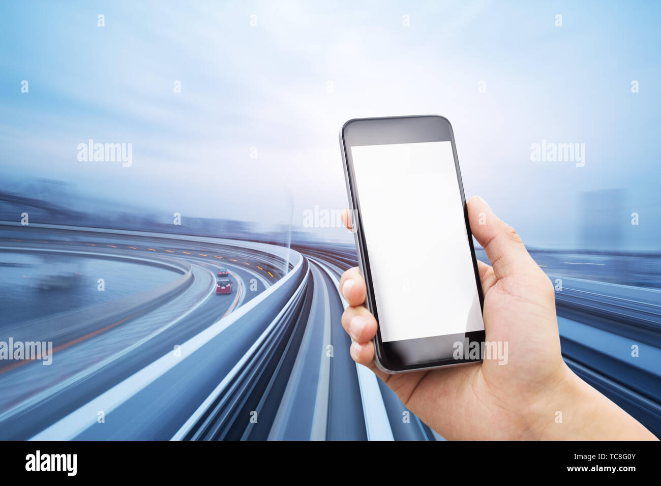 mobile phone with speed railroad track in modern city Stock Photo - Alamy