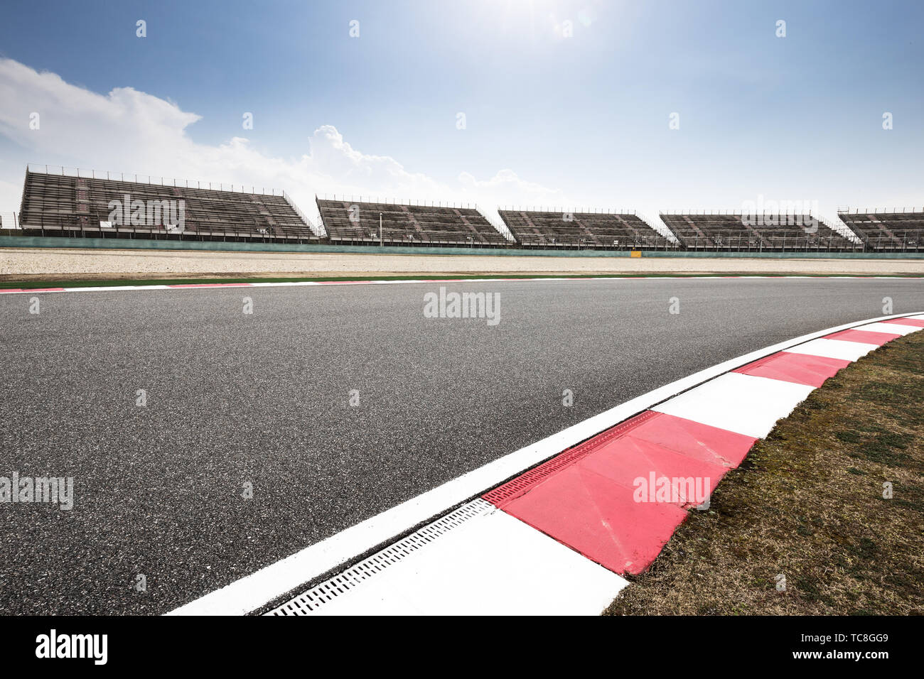 Empty asphalt road in car track Stock Photo - Alamy