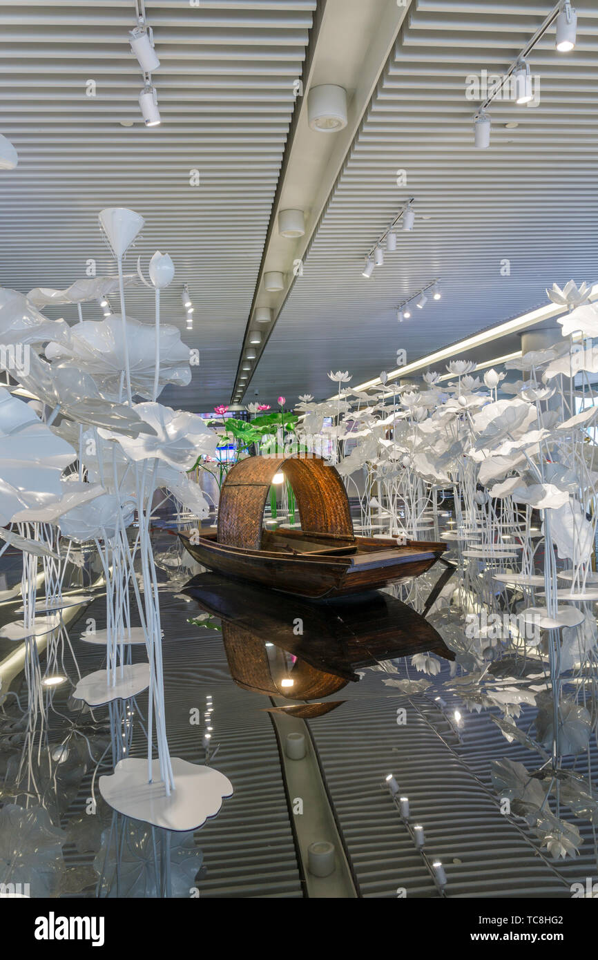 Fishing boats and lotus artwork Stock Photo - Alamy