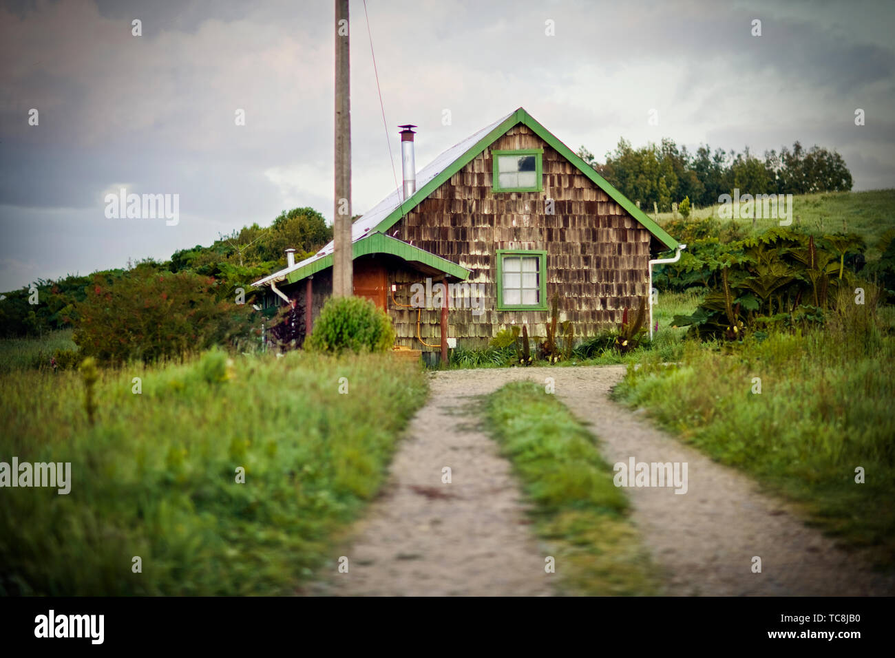 Farm house in a field Stock Photo - Alamy