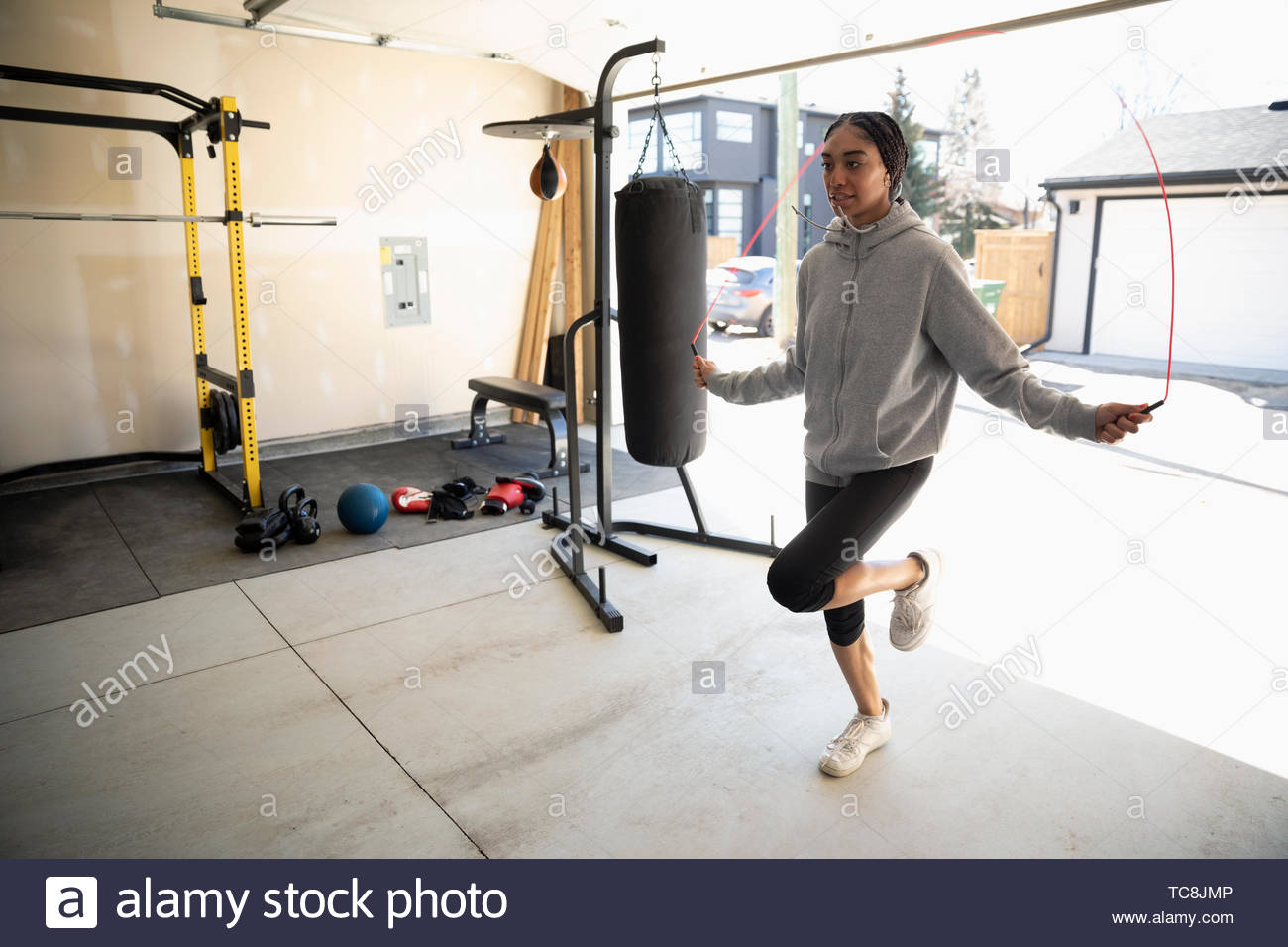 Girl jumping rope hi-res stock photography and images - Alamy