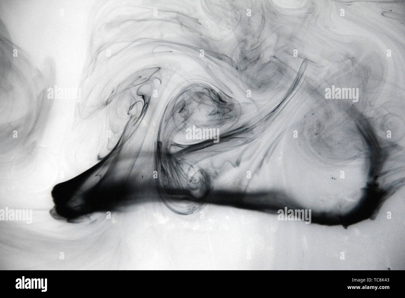 Ink background, ink flowing in water Stock Photo - Alamy