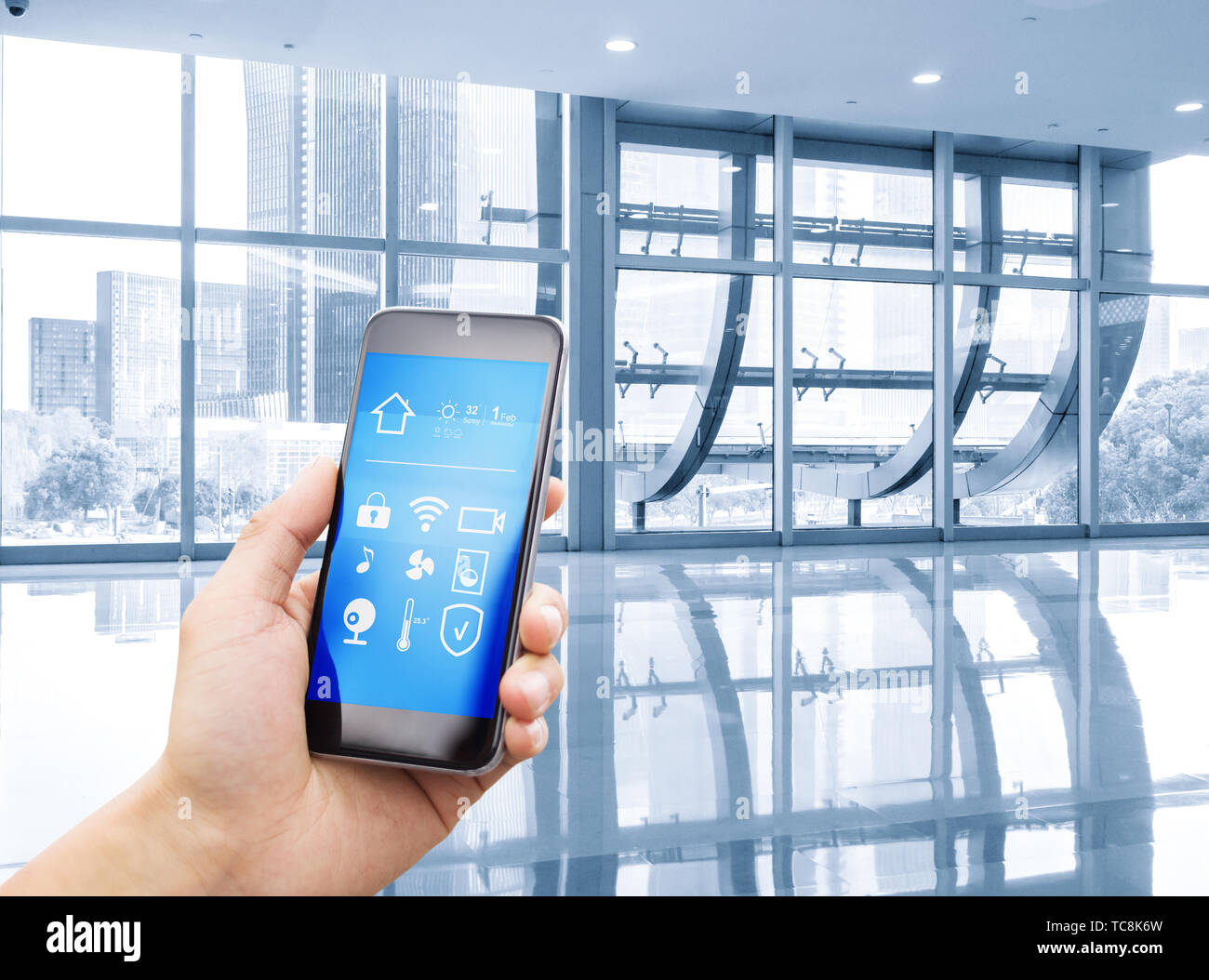 smart phone with smart home with modern hall Stock Photo - Alamy