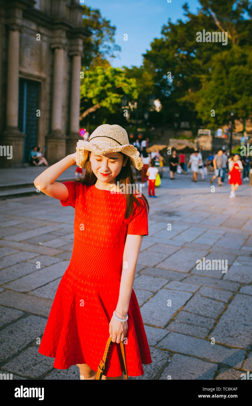 Red dress to Macau Stock Photo - Alamy