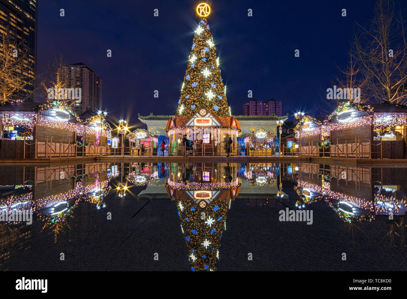 Christmas tree reflection in Chengdu landmark Taikuri Stock Photo - Alamy