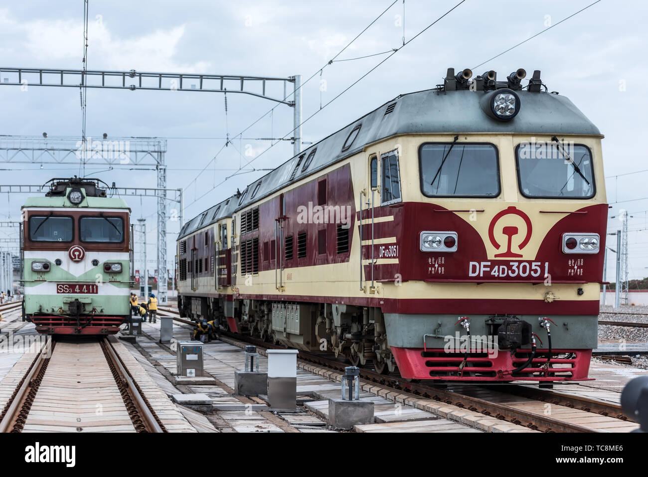 Railway workers maintain high-speed rail tracks in Kunming, southwest ...