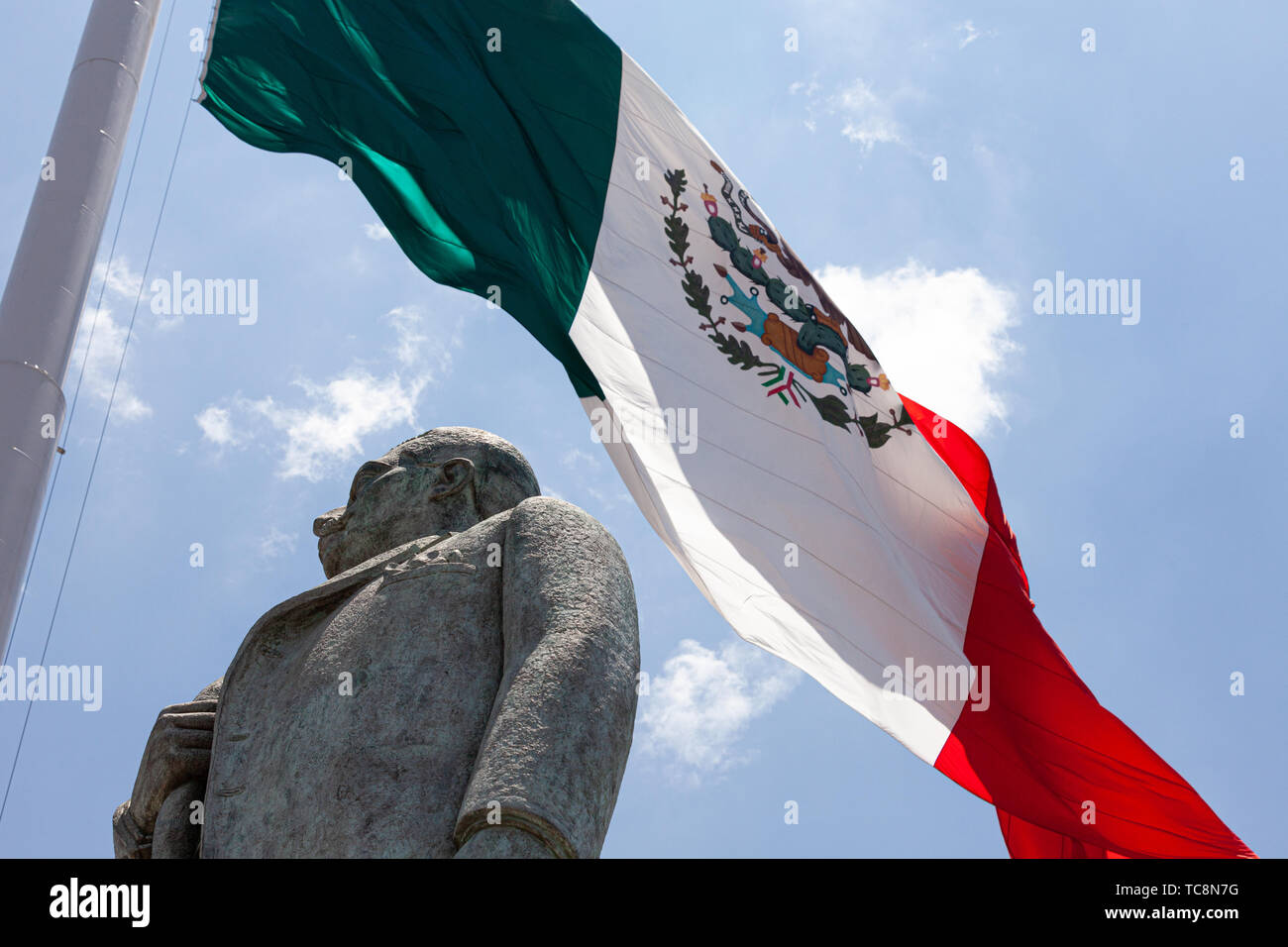 Statue of Manuel Jose Othon and Mexican Flag Stock Photo - Alamy