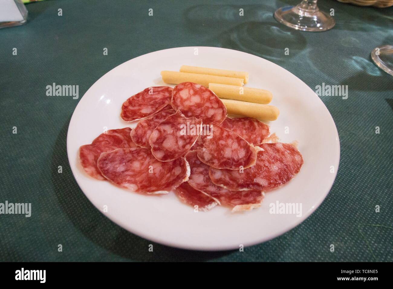 Spanish appetizer longaniza slices Stock Photo - Alamy