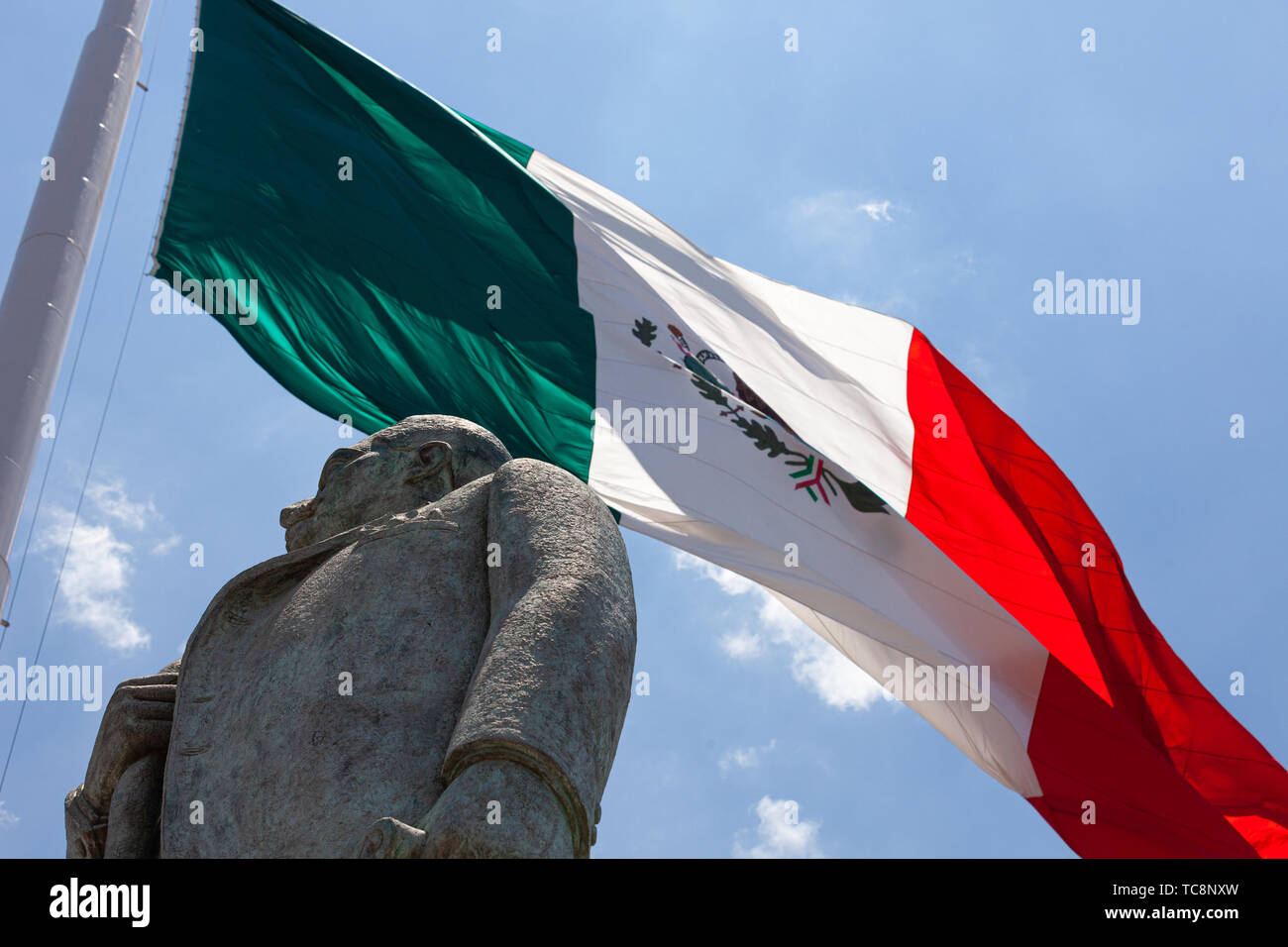 Statue of Manuel Jose Othon and Mexican Flag Stock Photo - Alamy