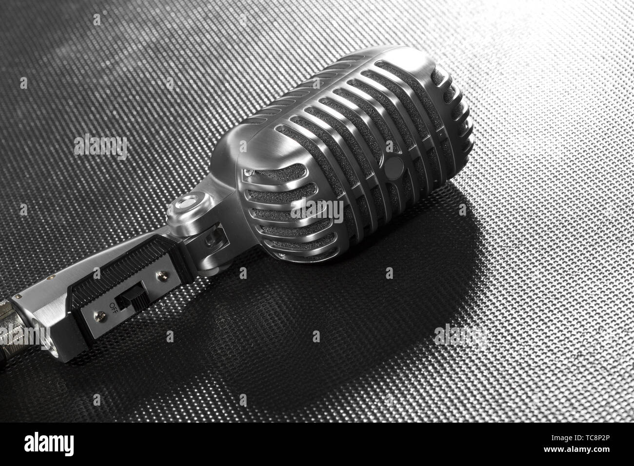 vintage microphone over black Stock Photo - Alamy