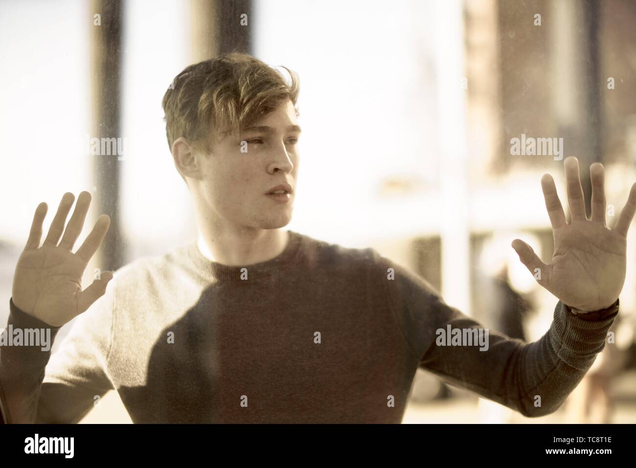 Man behind glass hi-res stock photography and images - Alamy