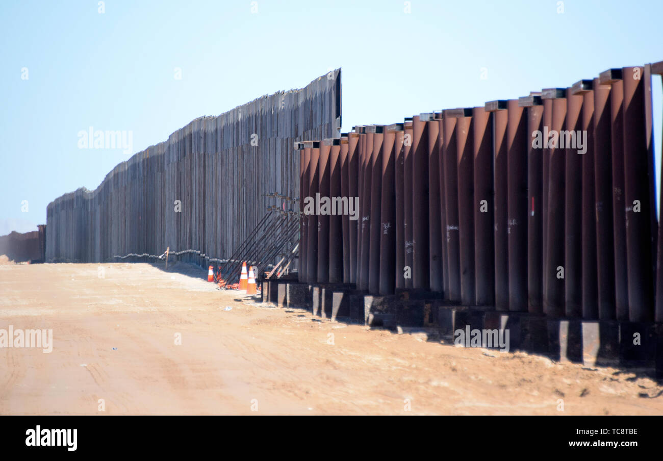 A 30-foot-tall barrier wall replaces an older, shorter wall in the Yuma ...