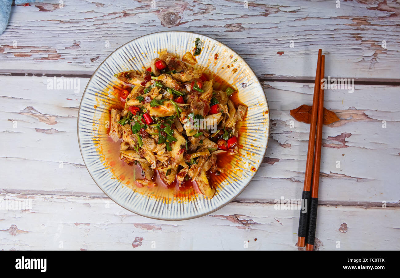 drooling chicken, stick chicken Stock Photo - Alamy