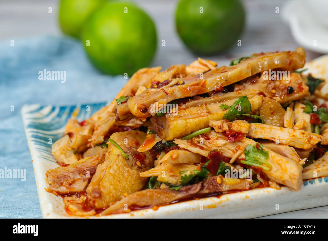 drooling chicken, stick chicken Stock Photo - Alamy