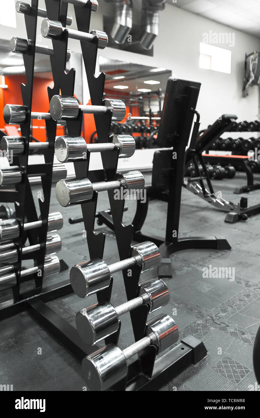 Dumbbells in the gym Stock Photo - Alamy