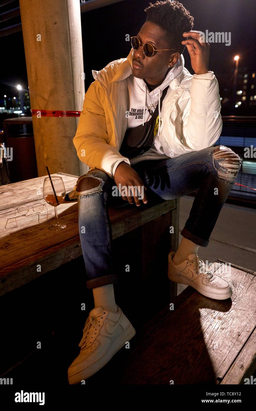 Man outside night club hi-res stock photography and images - Alamy