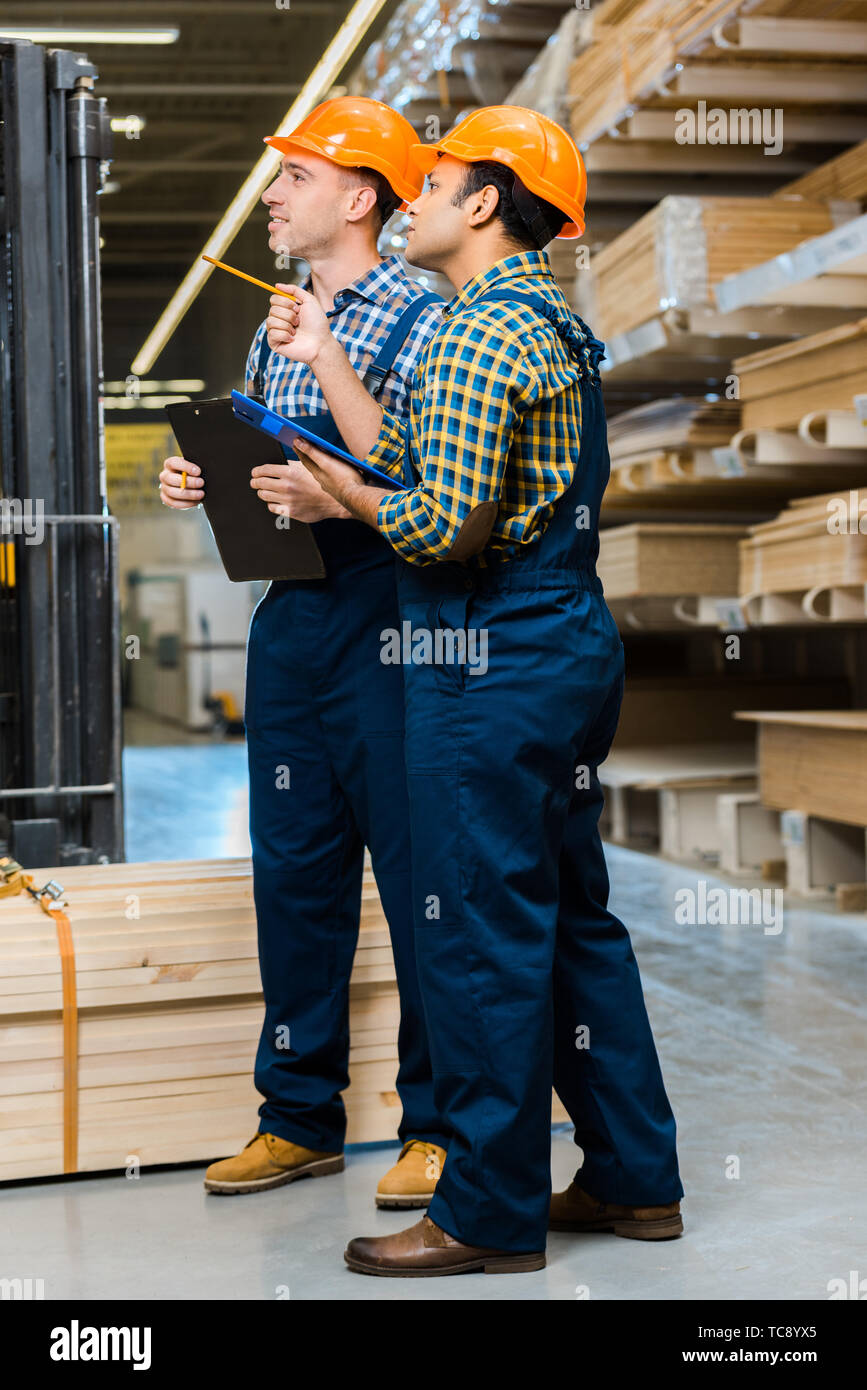 Construction workers hardhats multicultural hi-res stock photography ...