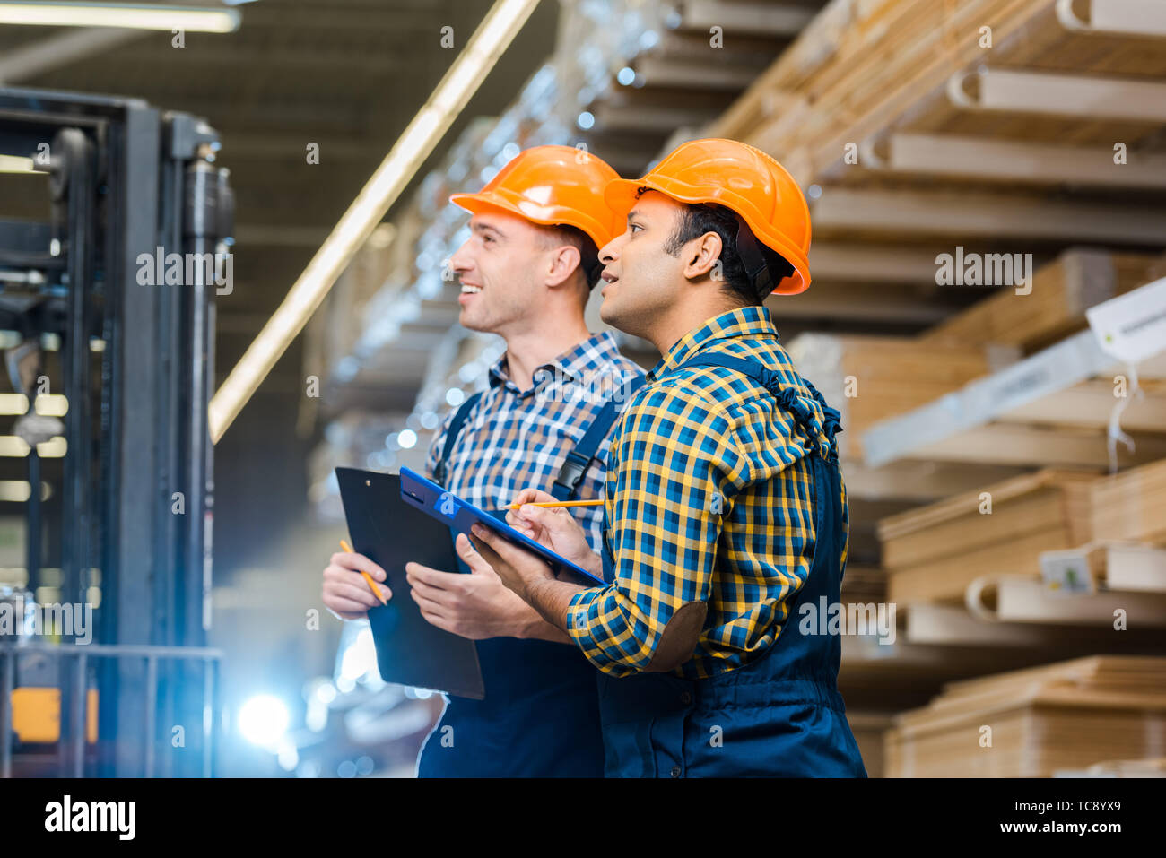 Construction workers hardhats multicultural hi-res stock photography ...