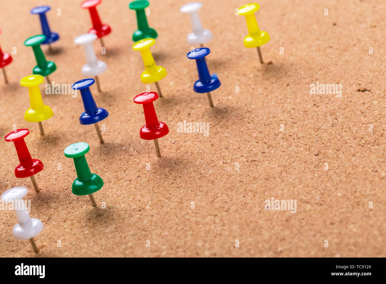 Pin board texture for background and colorful pins Stock Photo - Alamy