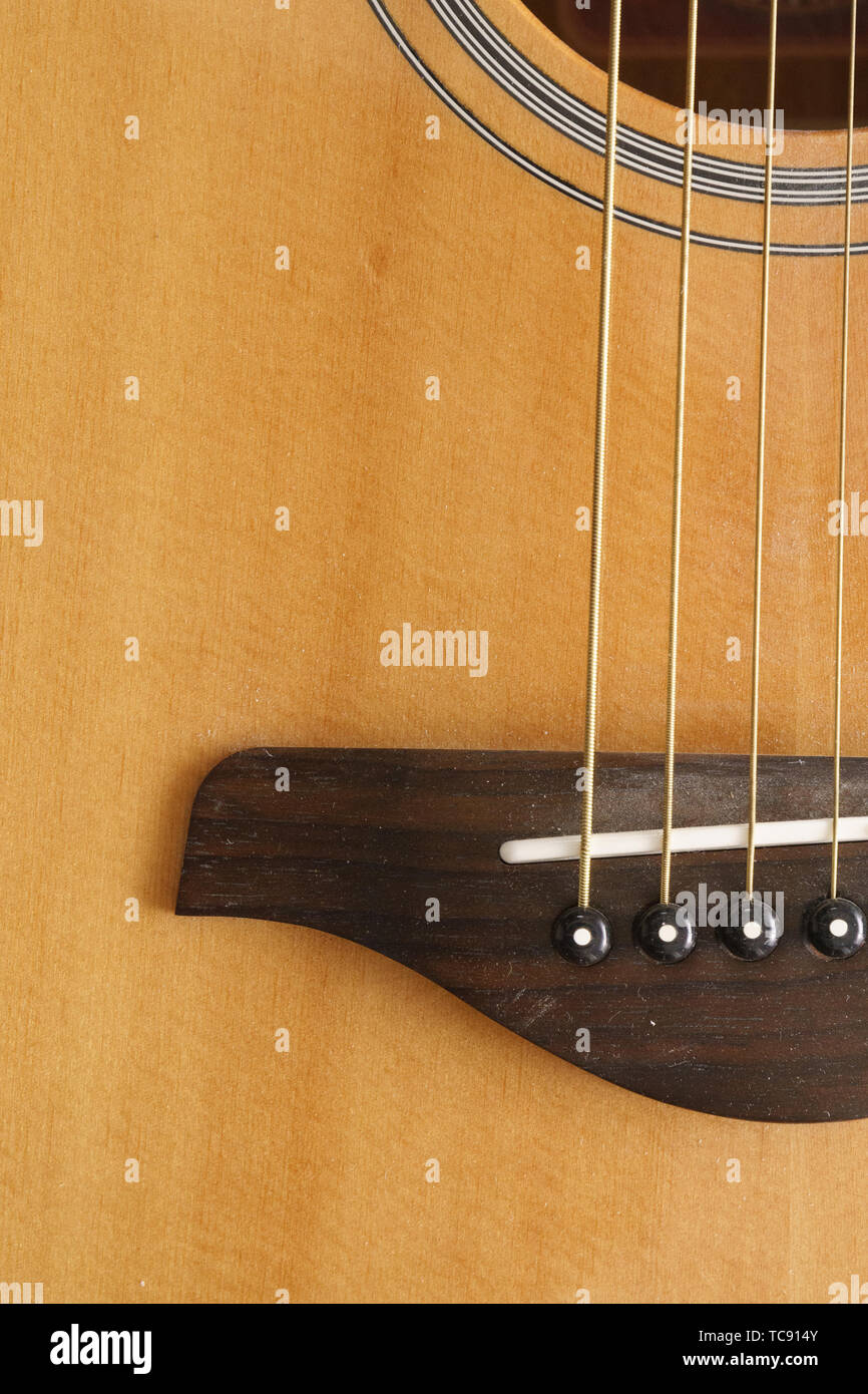 Acoustic guitar bridge Stock Photo - Alamy