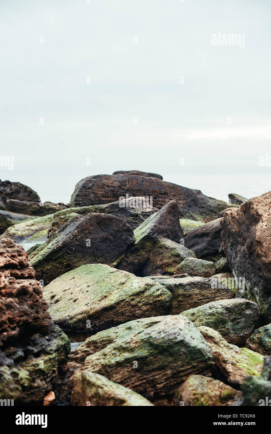 Vertical close up photo of big boulders on the beach. Nature landscape ...