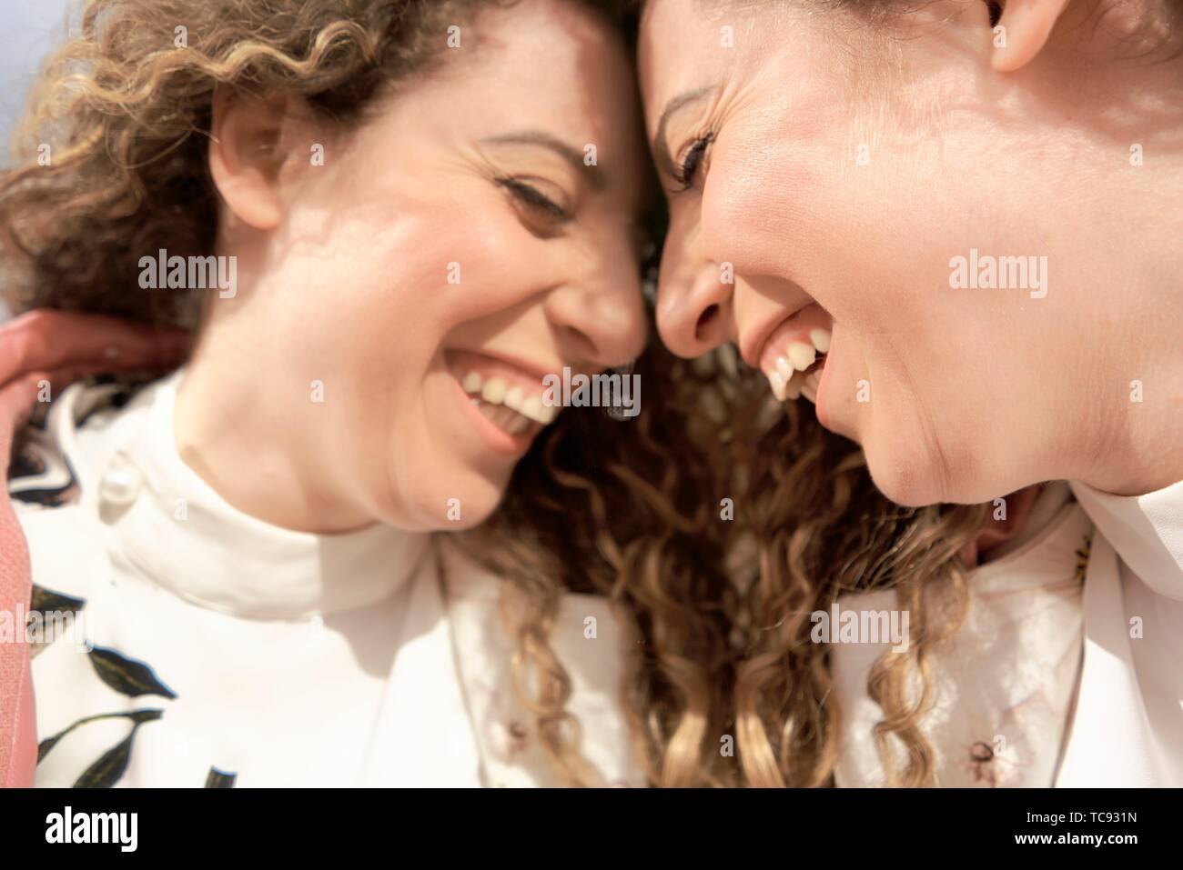 Laughing to herself hi-res stock photography and images - Alamy