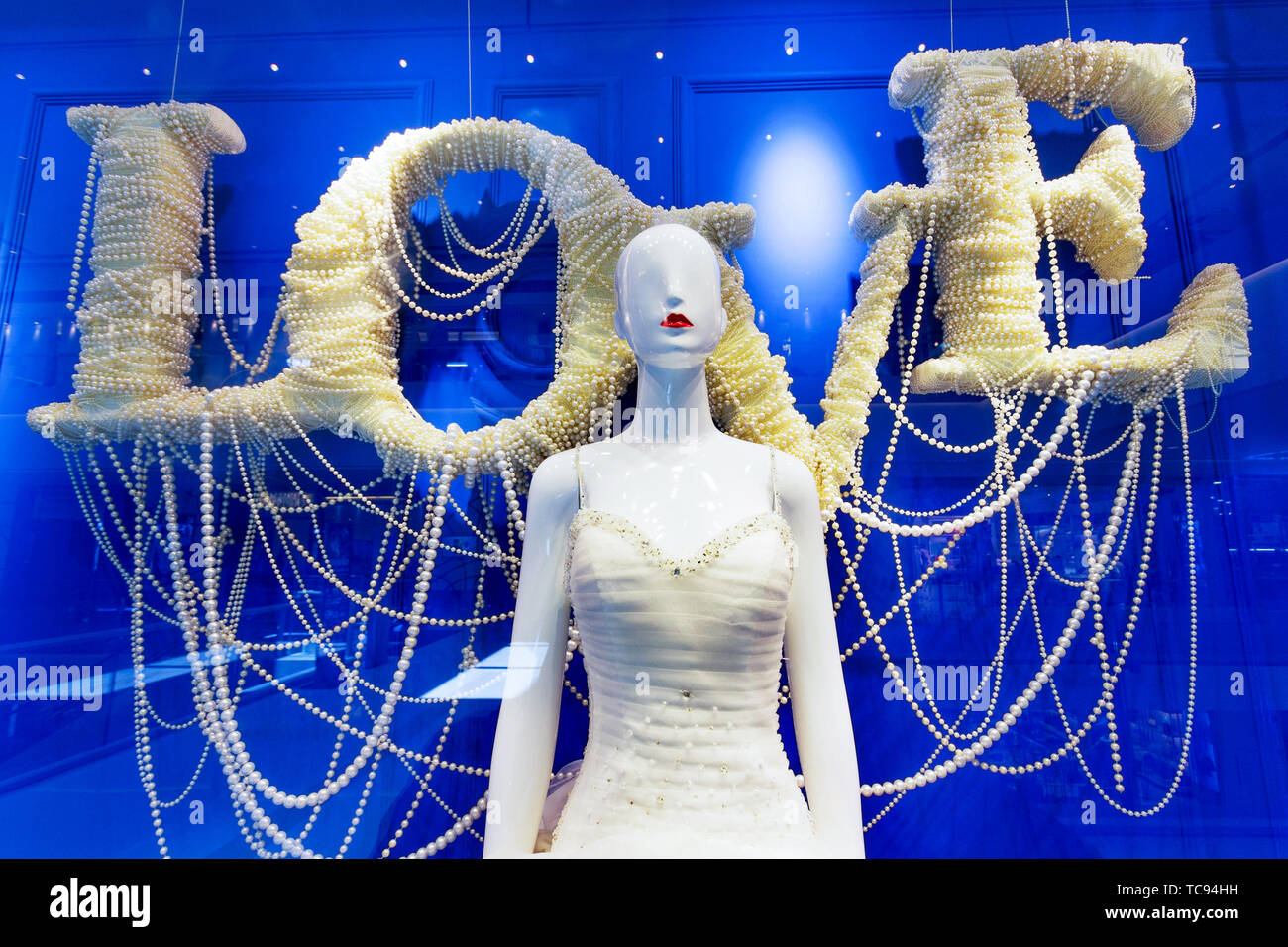 mannequin in shop display window Stock Photo - Alamy