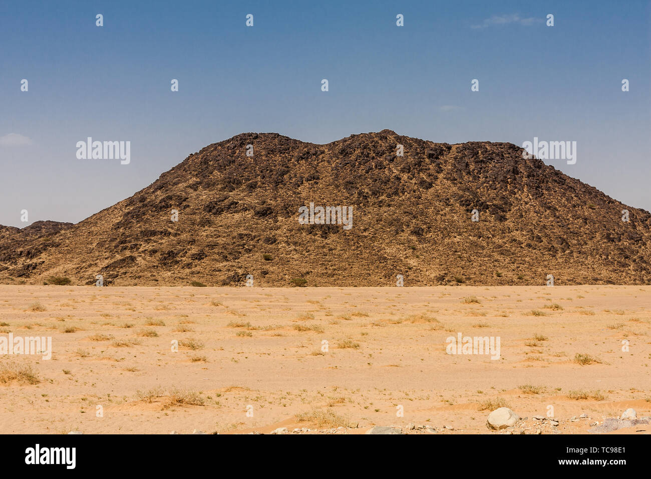A lava outcrop in the desert of Saudi Arabia. Such outcrops are results ...