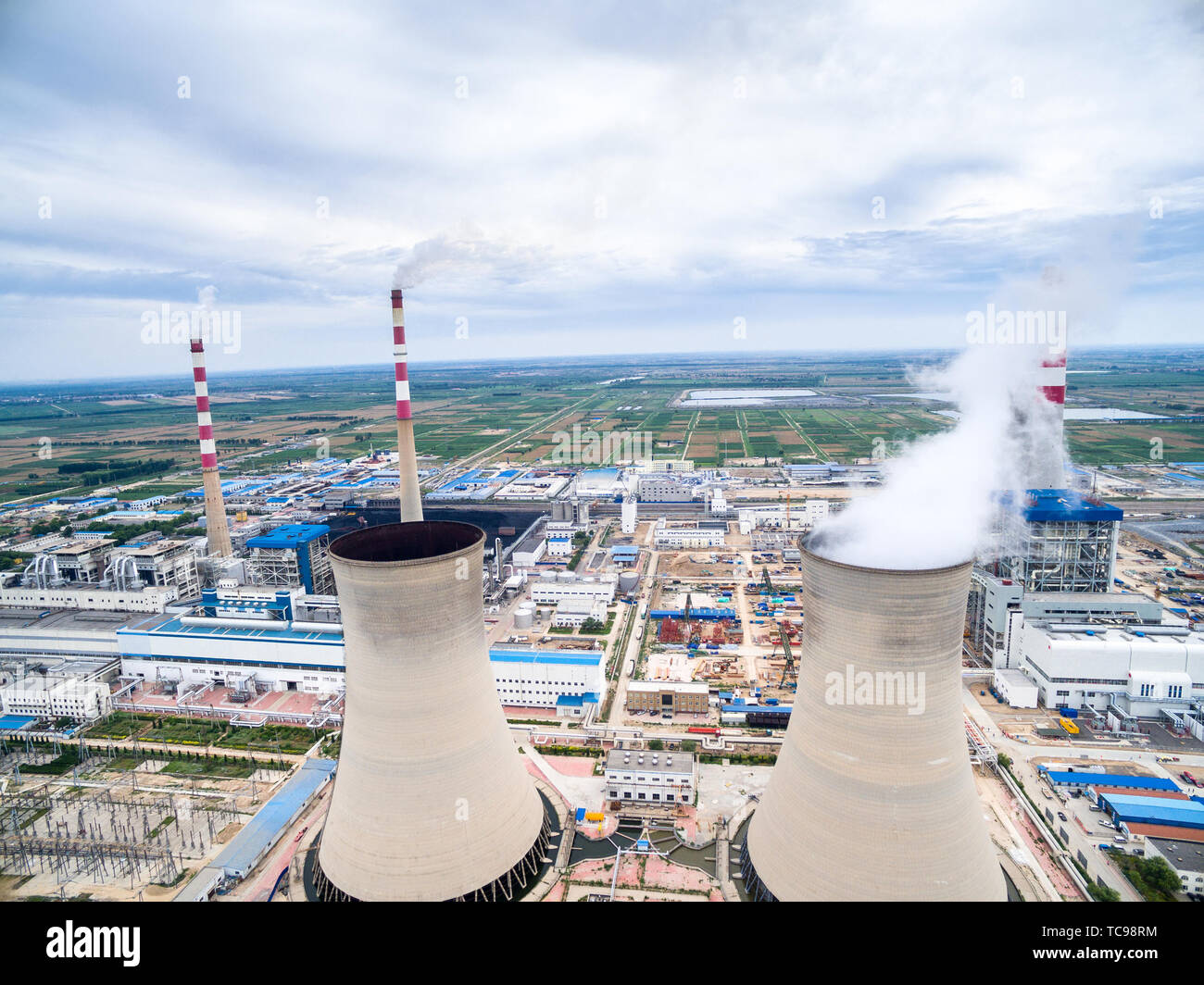 Skyline design tower in power plant Stock Photo - Alamy
