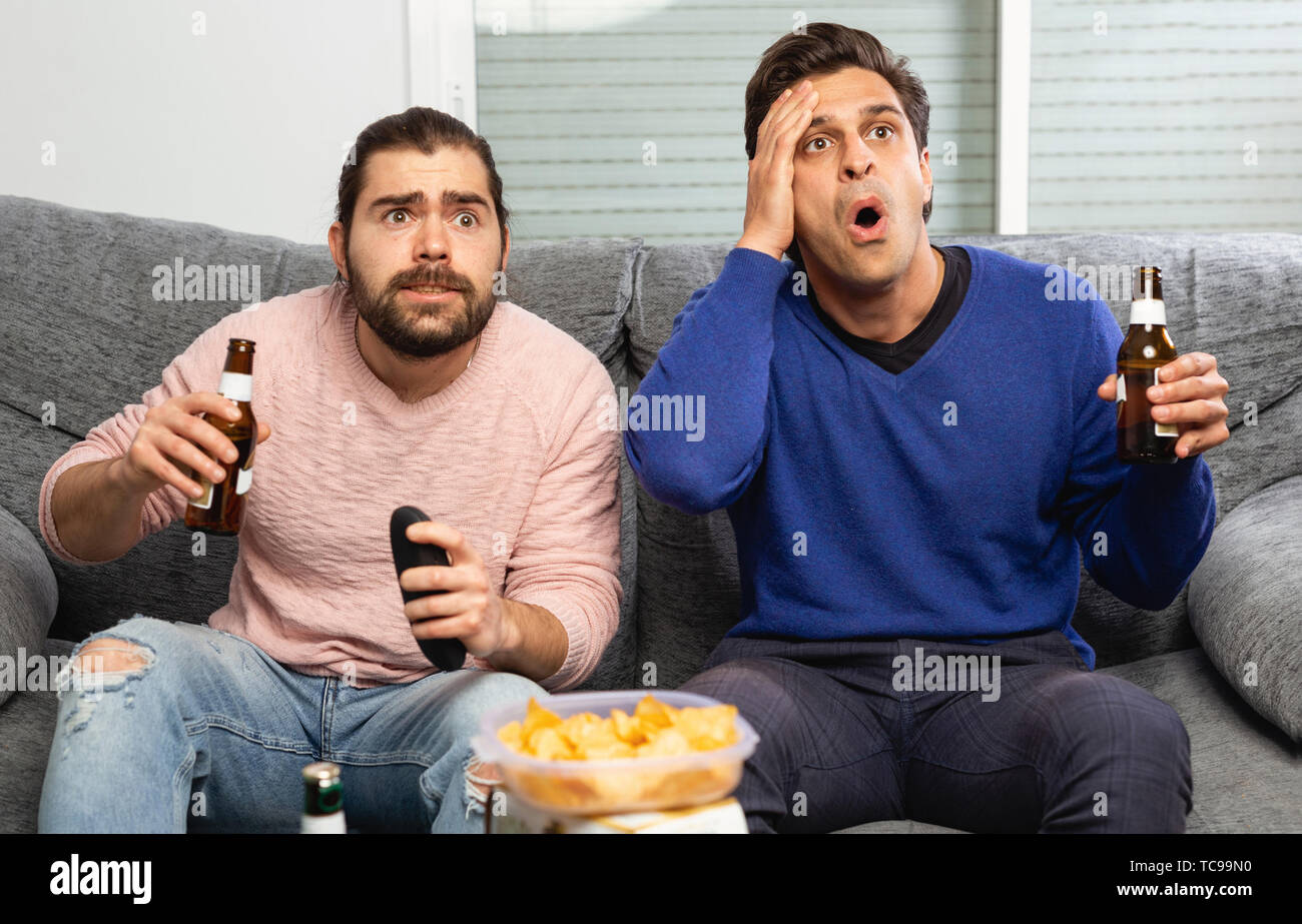 Two guys drinking beer on hi-res stock photography and images - Alamy