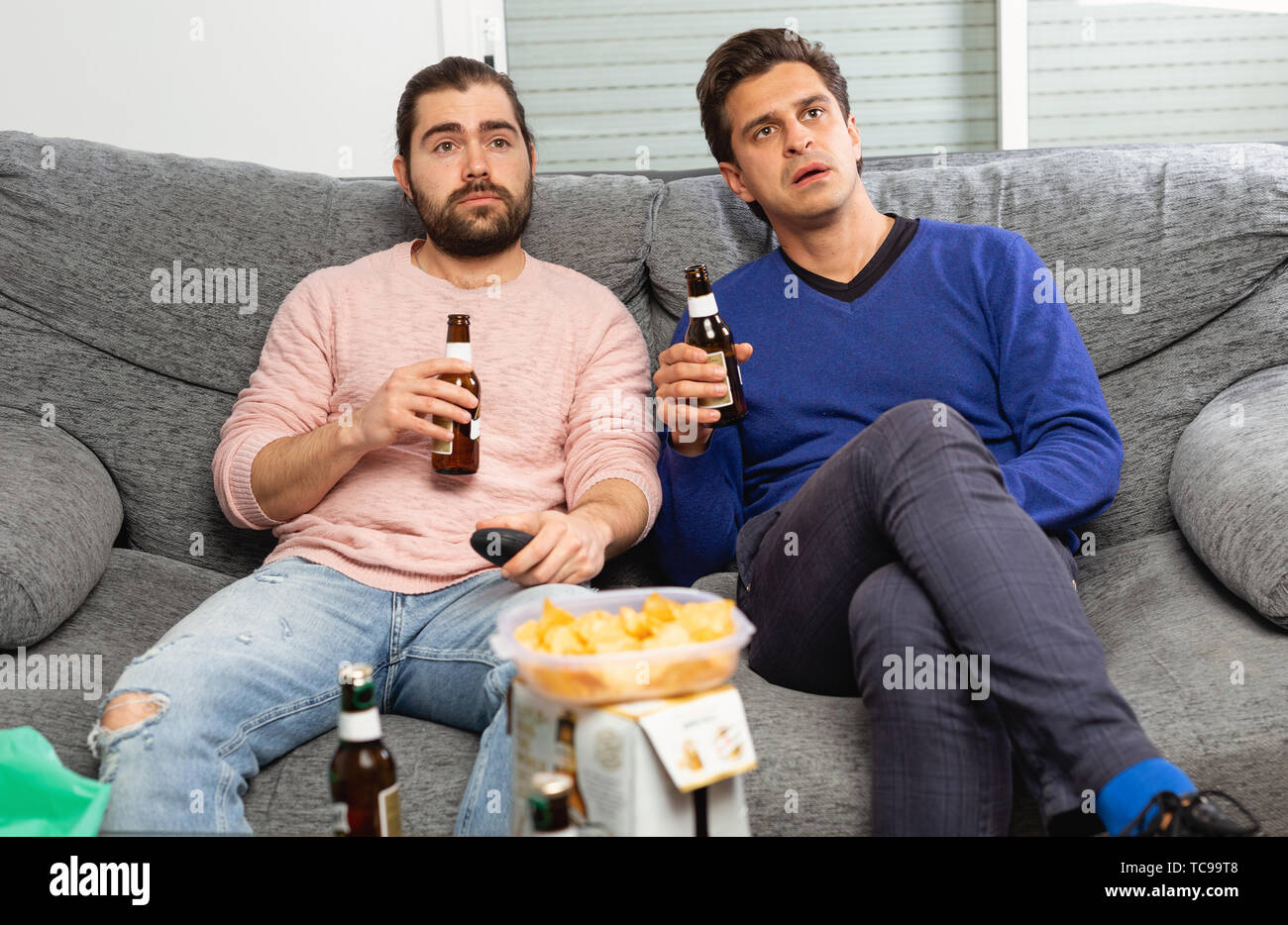 Two guys drinking beer on hi-res stock photography and images - Alamy