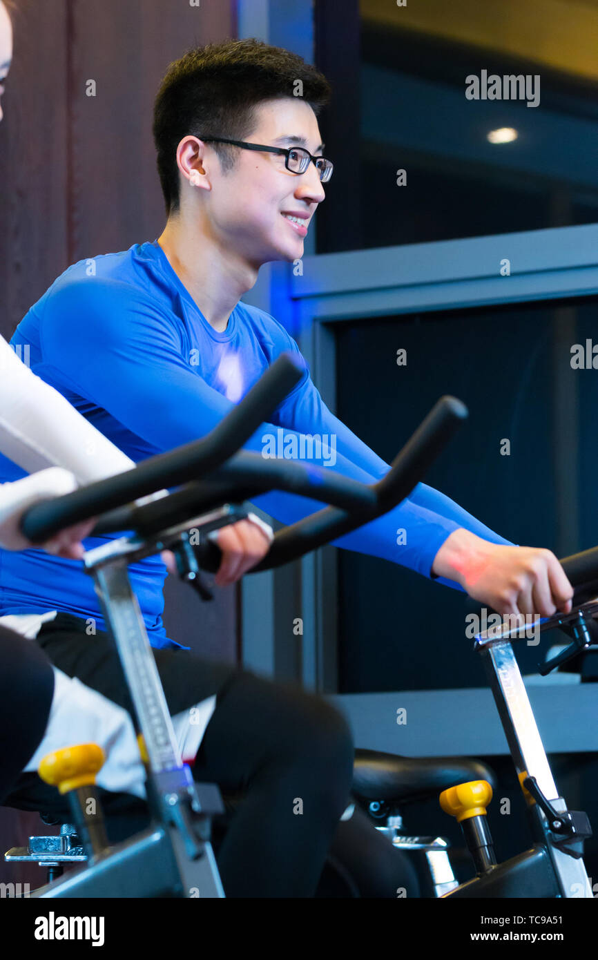 young asian people working out in modern gym Stock Photo - Alamy