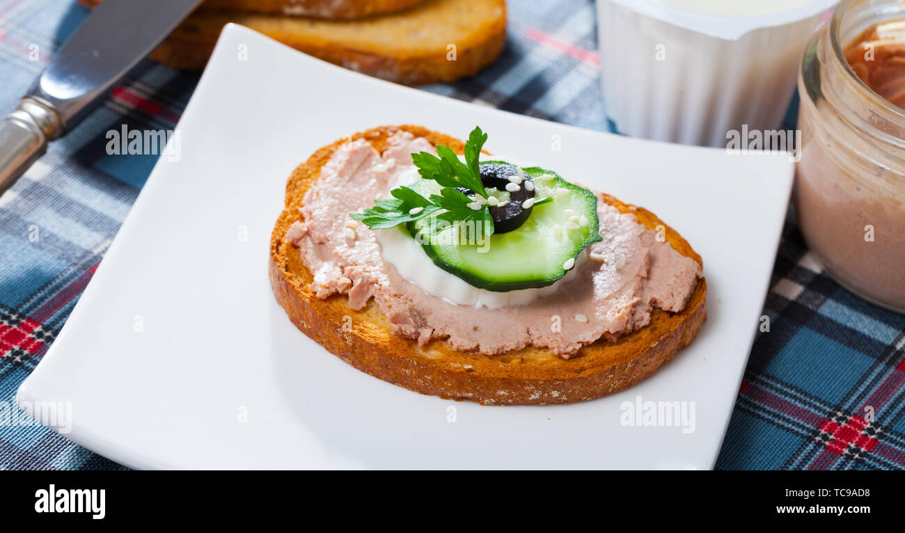 Sandwich with homemade chicken liver pate, green cheese and vegetables ...