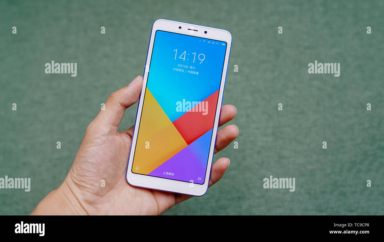 Red rice 6 red rice mobile phone 6 Stock Photo - Alamy