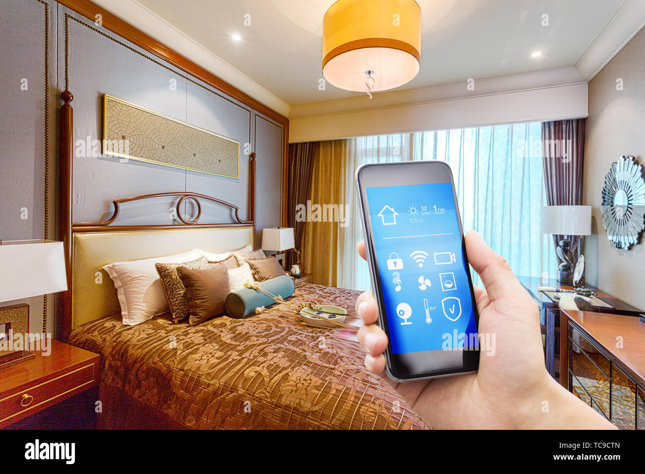smart phone with smart home with modern bedroom Stock Photo - Alamy