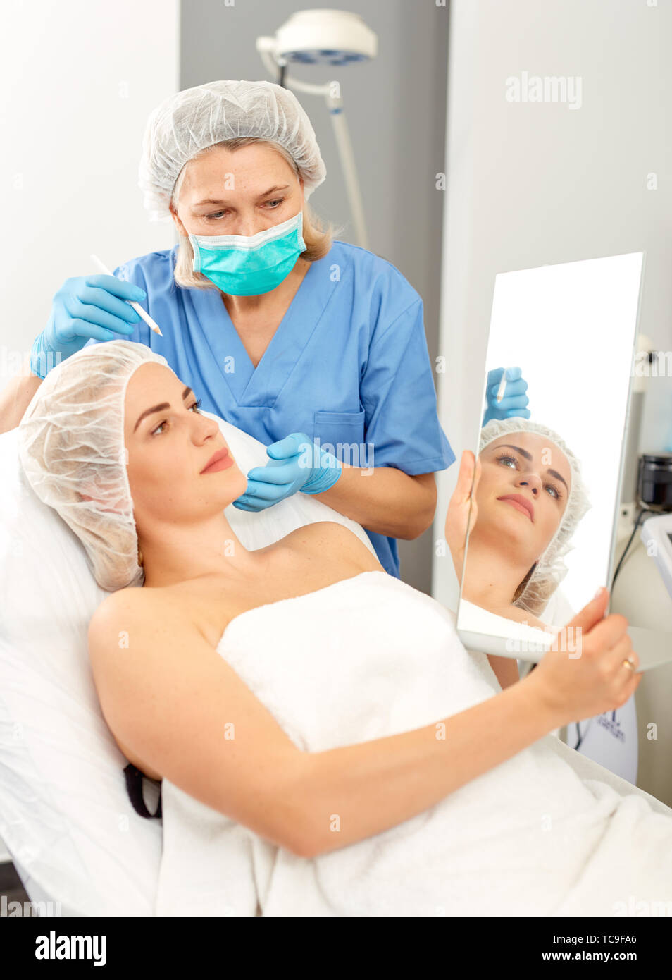 Woman getting ready for plastic surgery Stock Photo - Alamy