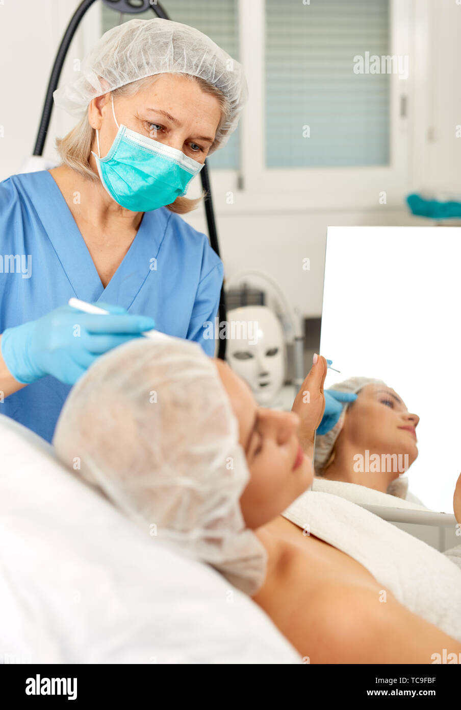 Woman getting ready for plastic surgery Stock Photo - Alamy